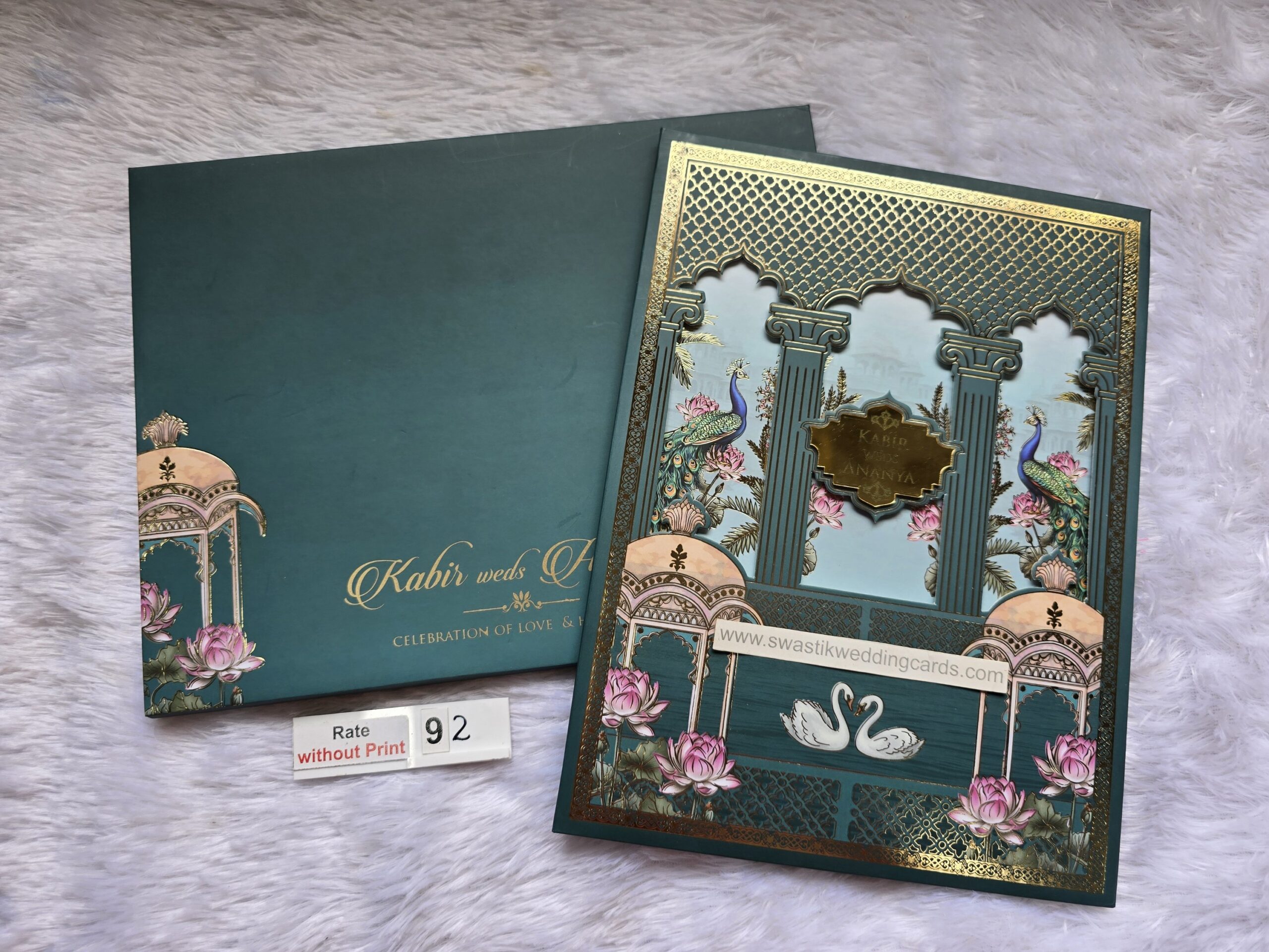 premium hardbound wedding invitation card with peacock print and 3D ...
