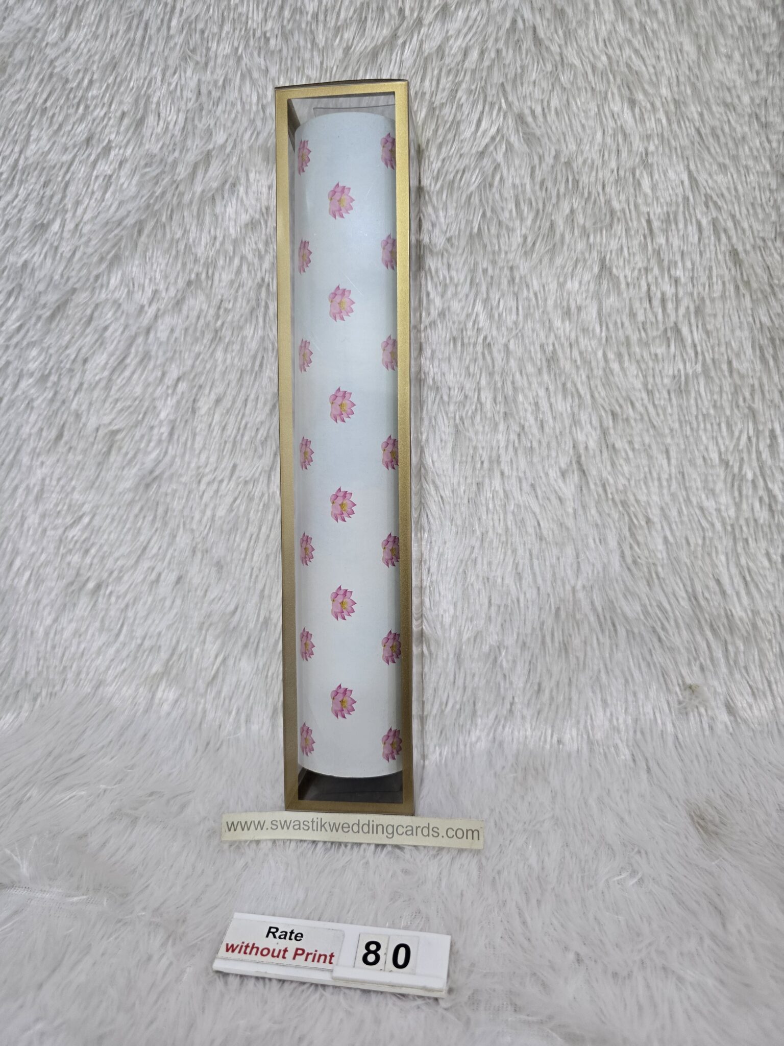 Plastic cube box with slider cover and paper scroll with design and ...