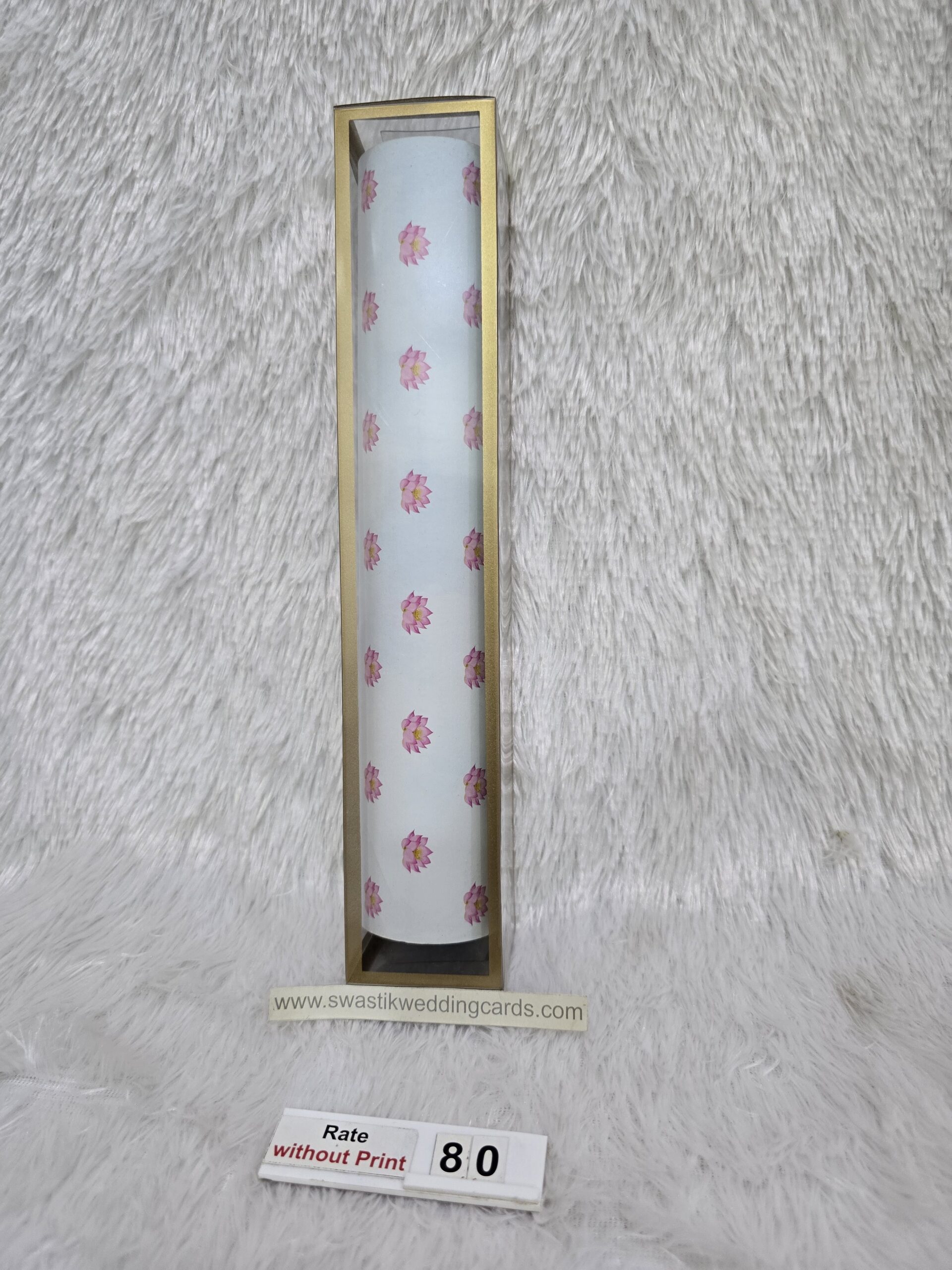 Plastic cube box with slider cover and paper scroll with design and ...