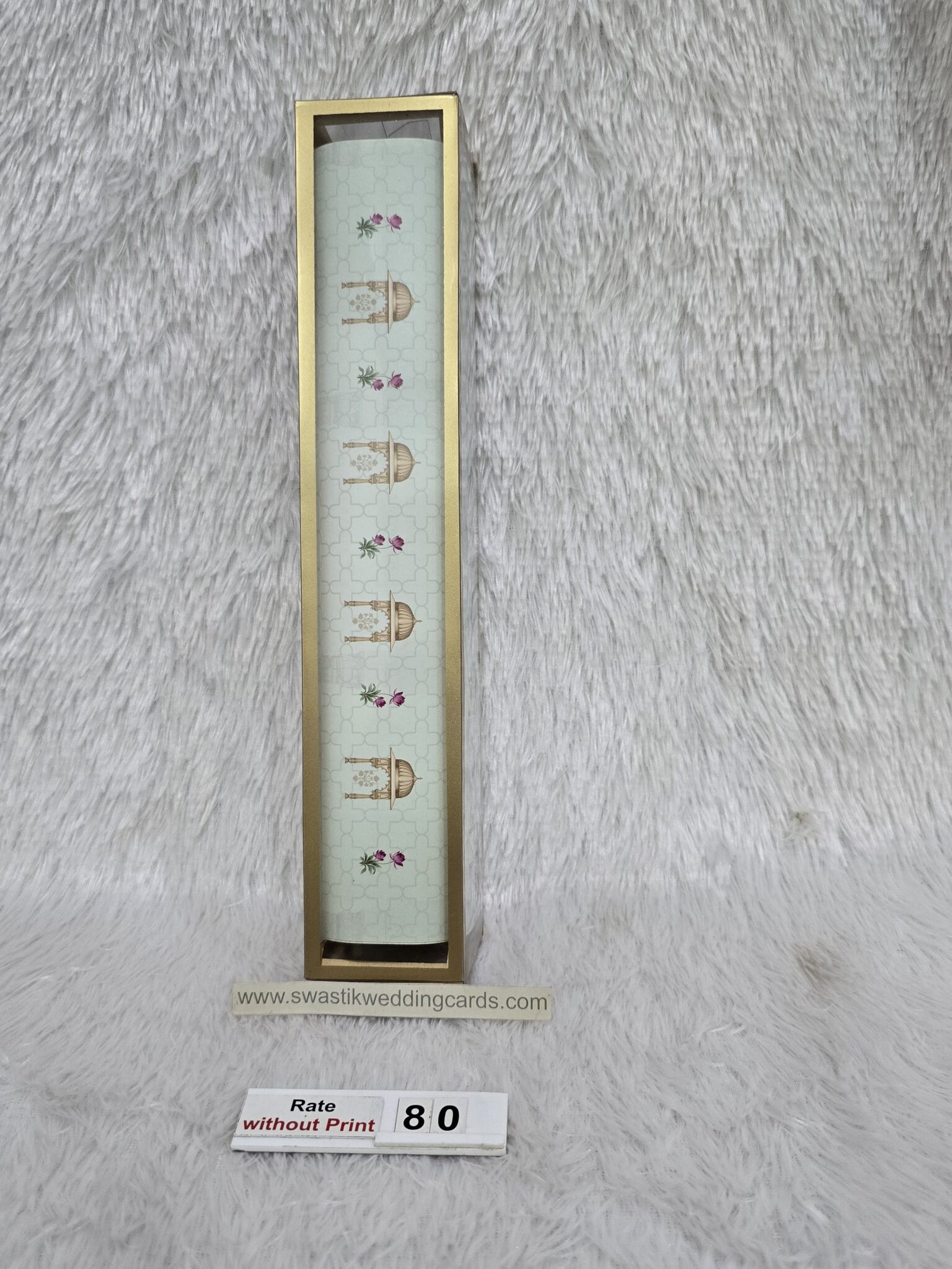 Plastic cube box with slider cover and paper scroll with design and ...