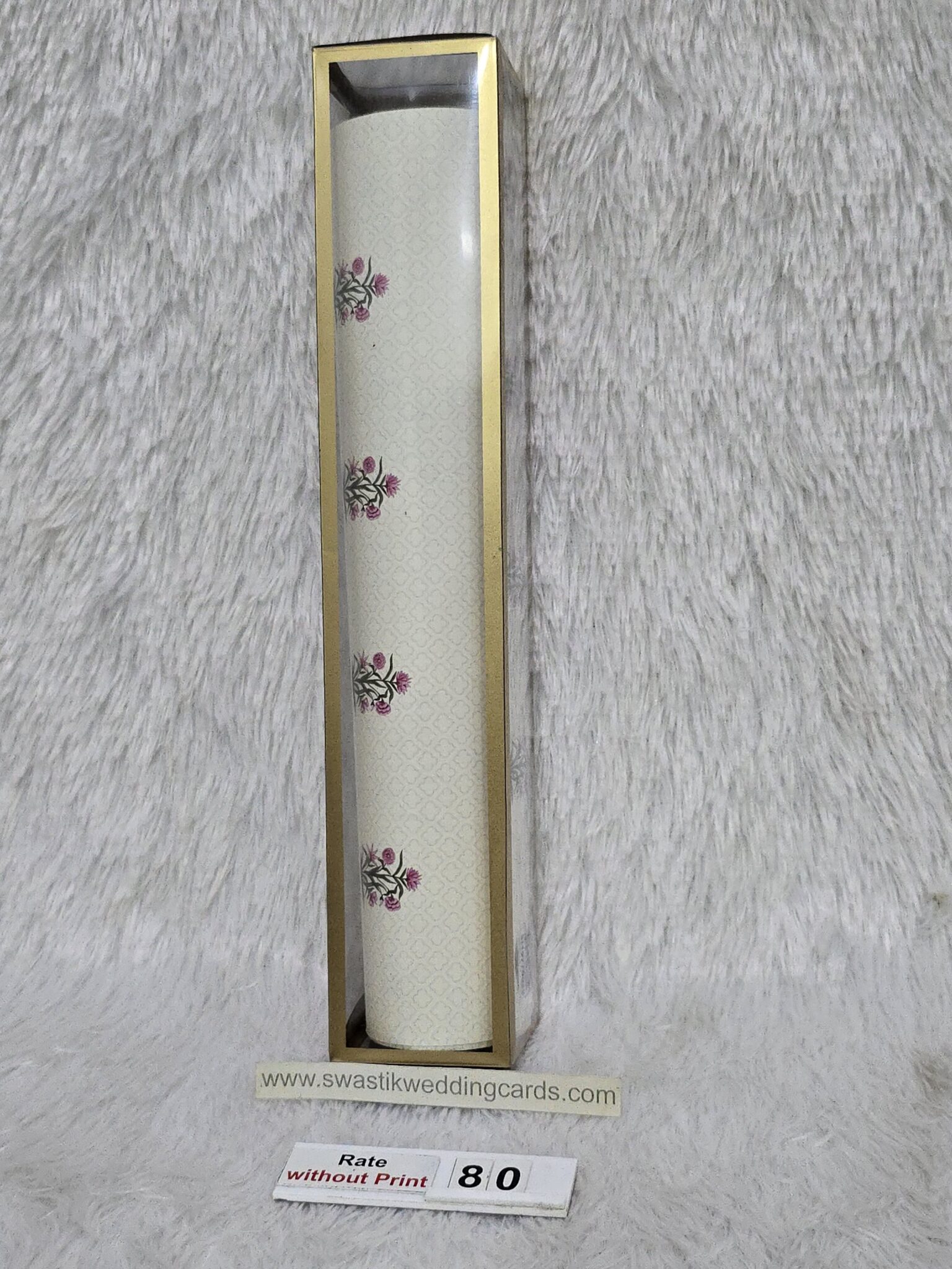 Plastic cube box with slider cover and paper scroll with design and ...