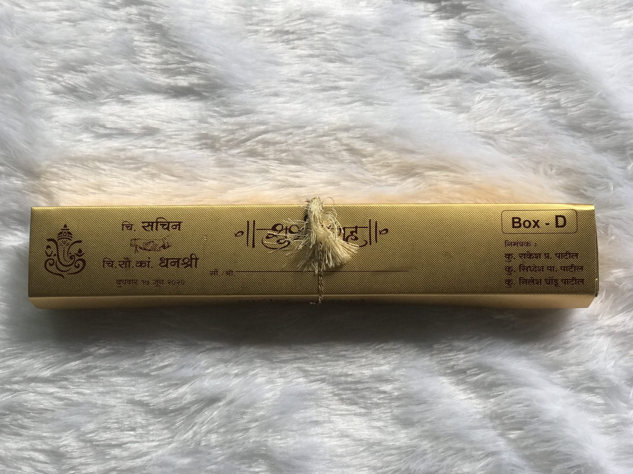 Golden scroll box with thread and scroll – Swastik Cards