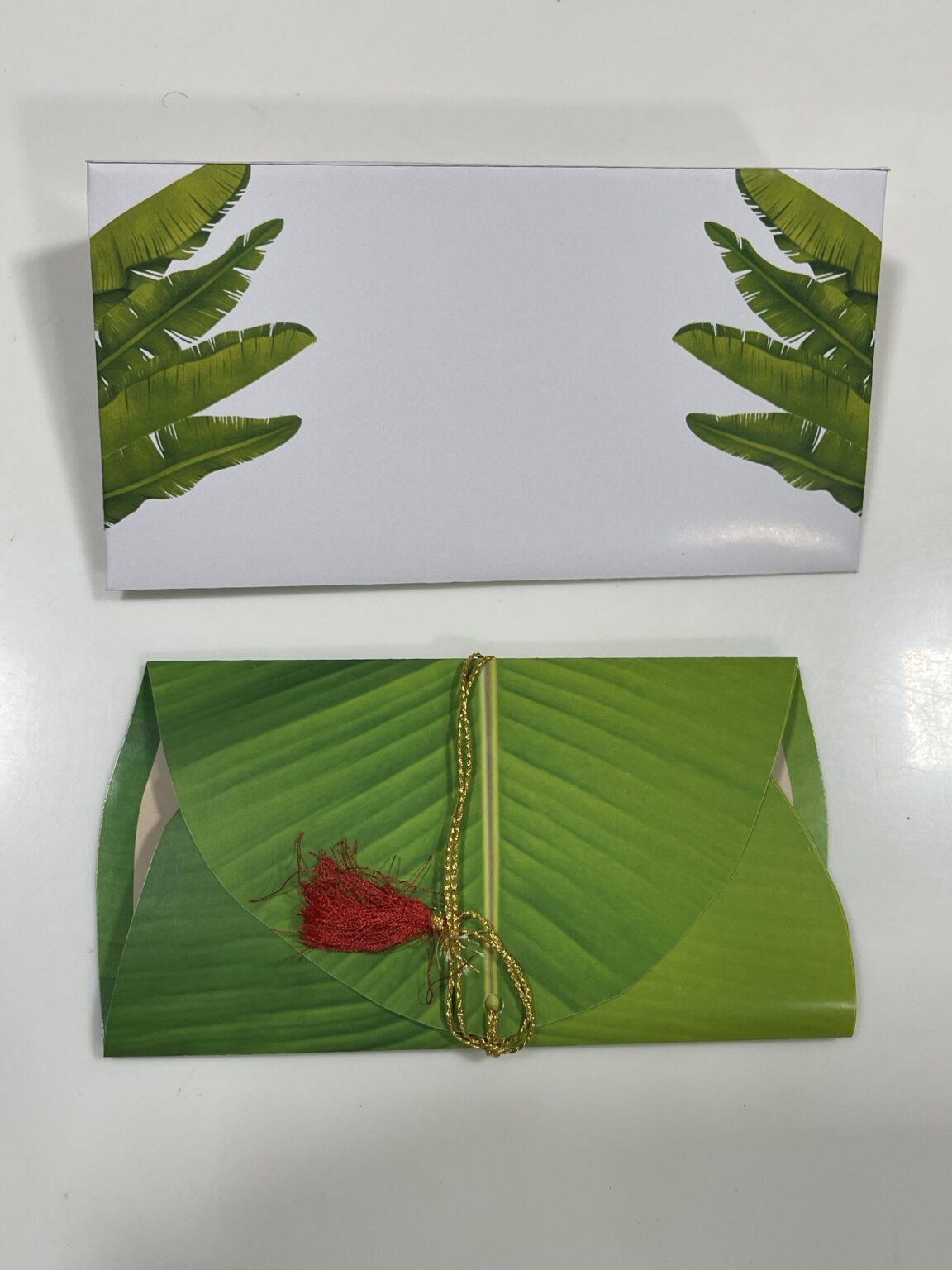 Banana Leaf theme wedding invitation card – Swastik Cards